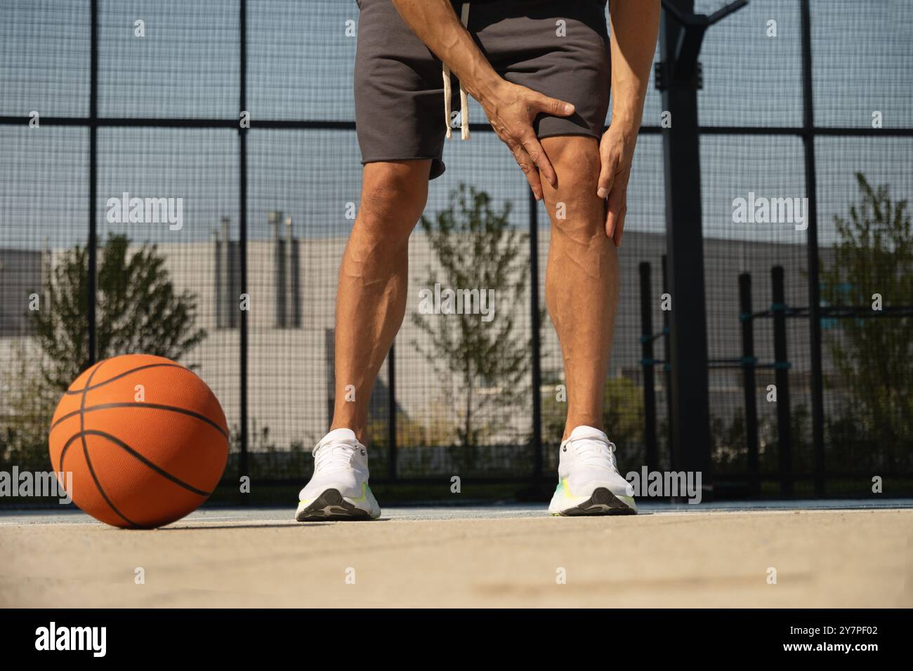 Basketball knee injury or pain. Basketball player check legs after ...