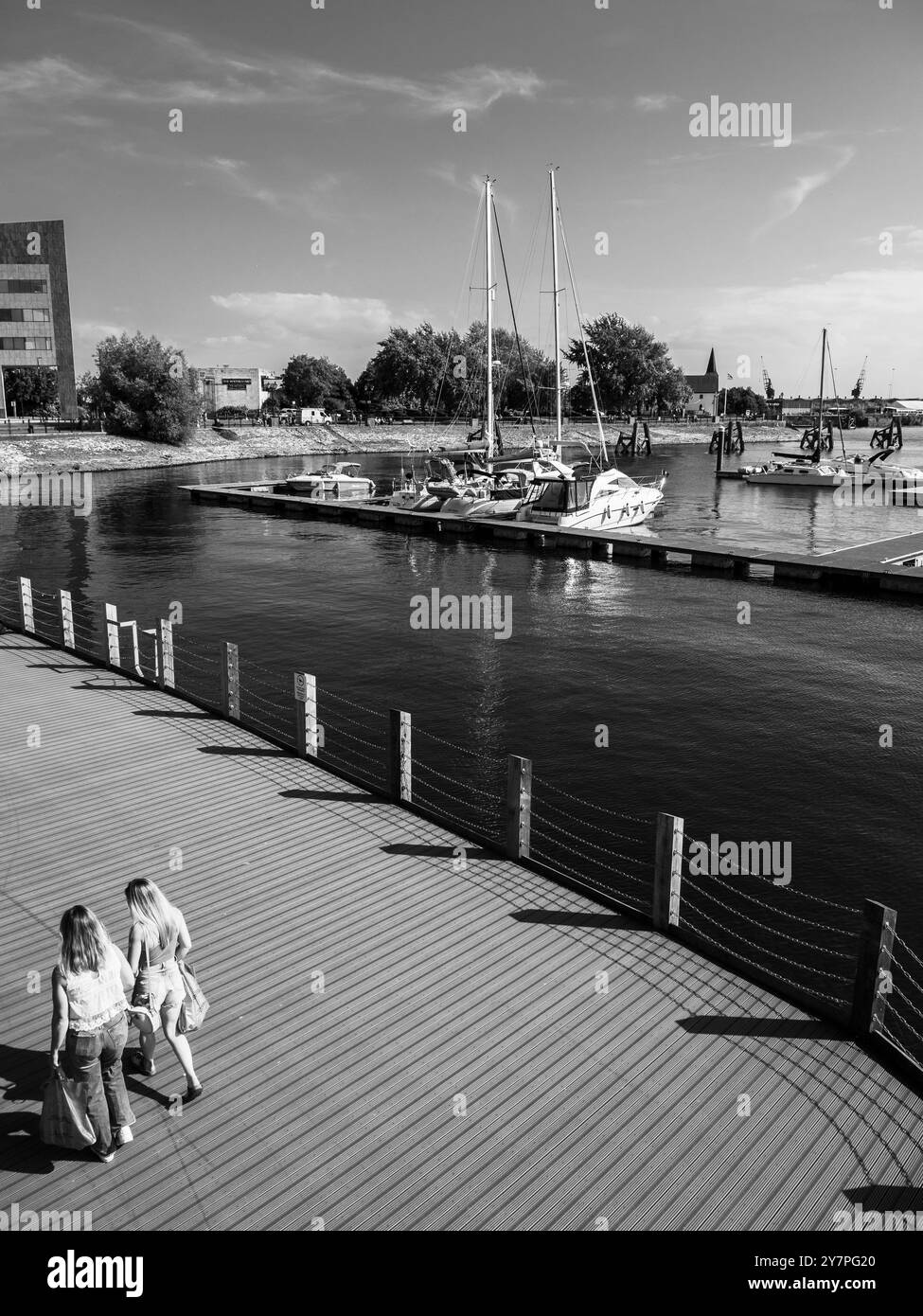 People walking on the waterfront, Black and White View of Waterfront at ...