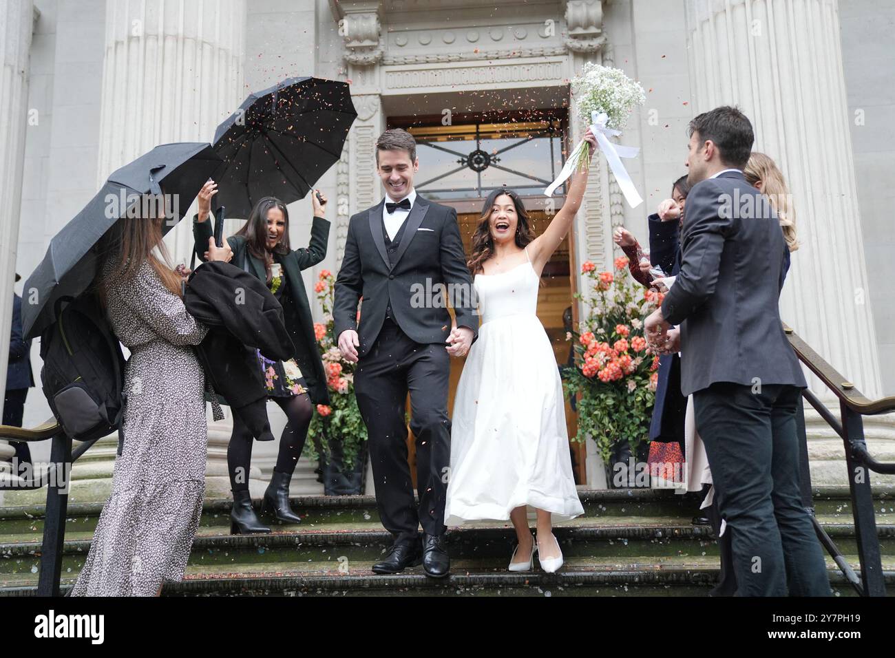 Australian couple Brad 31 and his bride Priscilla 32, Standfield walk ...