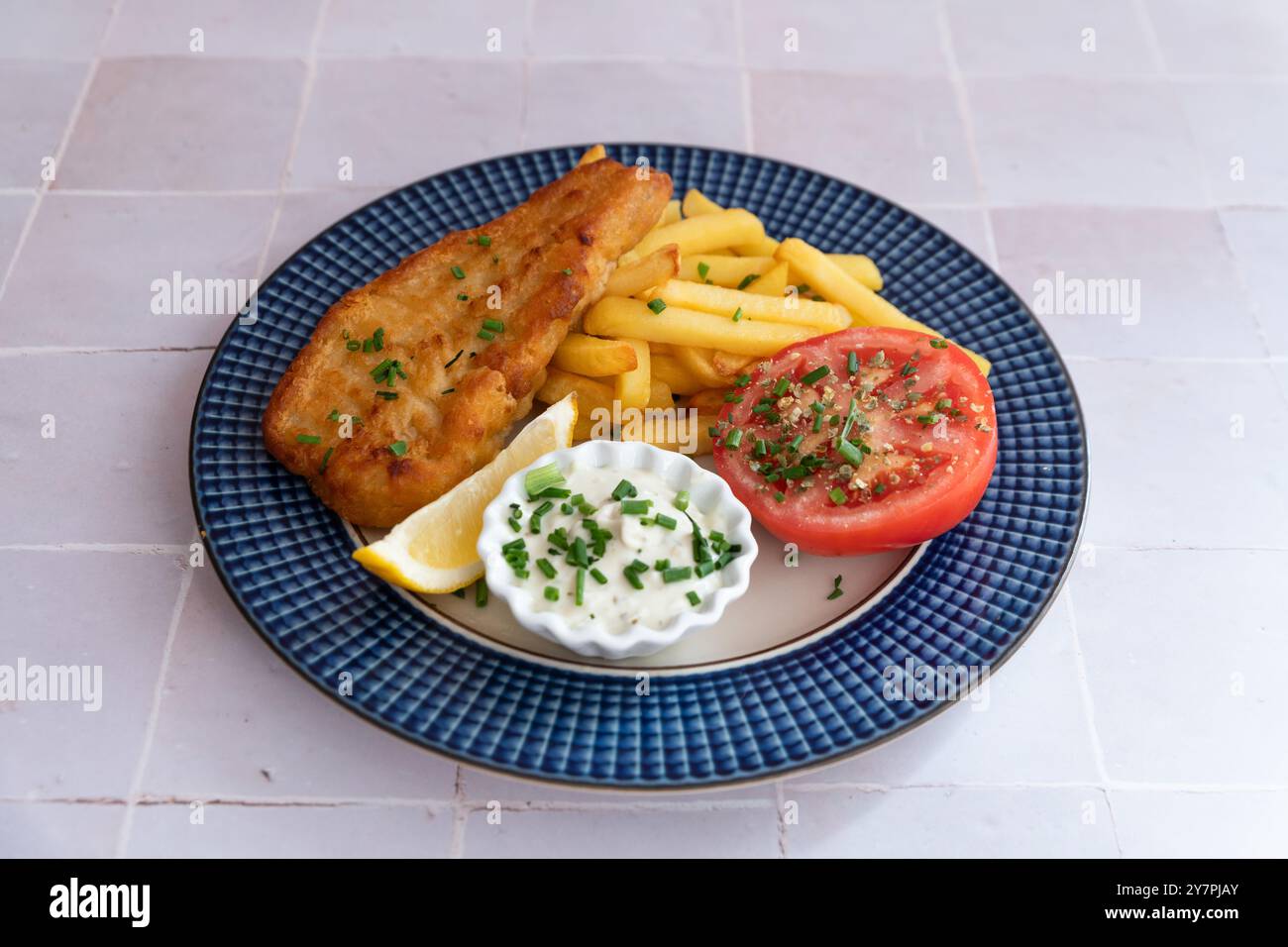 famous british hot plate named fish and chips Stock Photo - Alamy