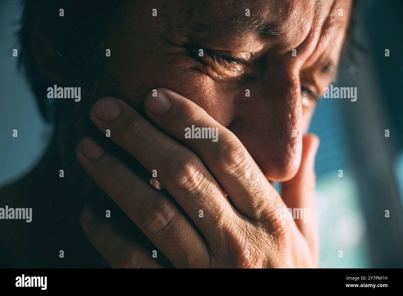 Emotional distraught sad man crying stressed, dealing with mental ...