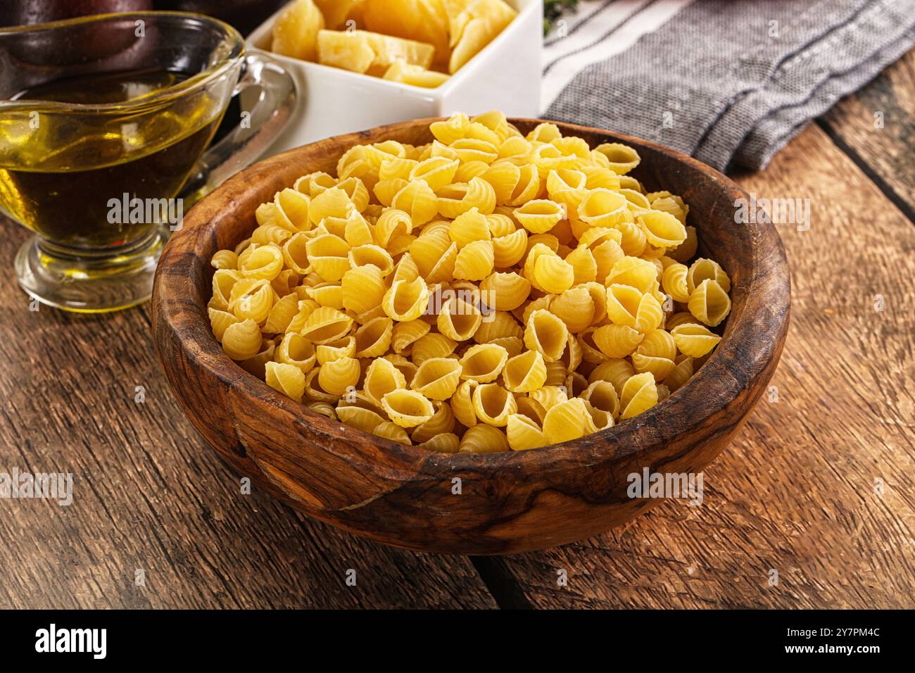 Italian cuisine - dry conchiglie shell pasta Stock Photo - Alamy