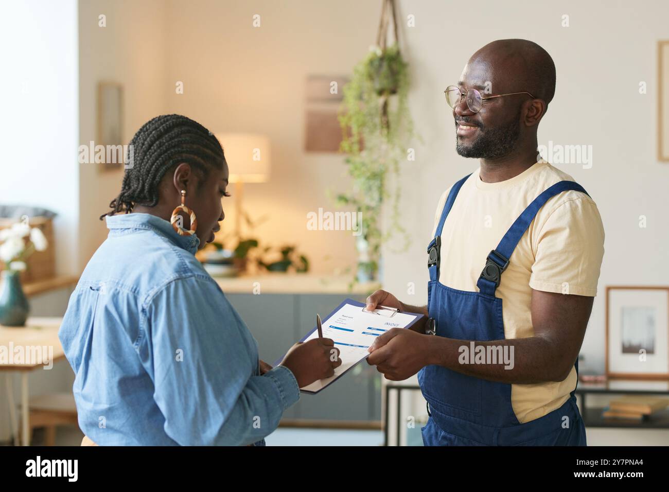 Service Worker Giving Contract Stock Photo - Alamy
