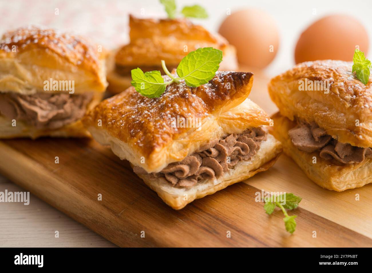 Miguelitos with chocolate truffle cream. Spanish chocolate puff pastry ...