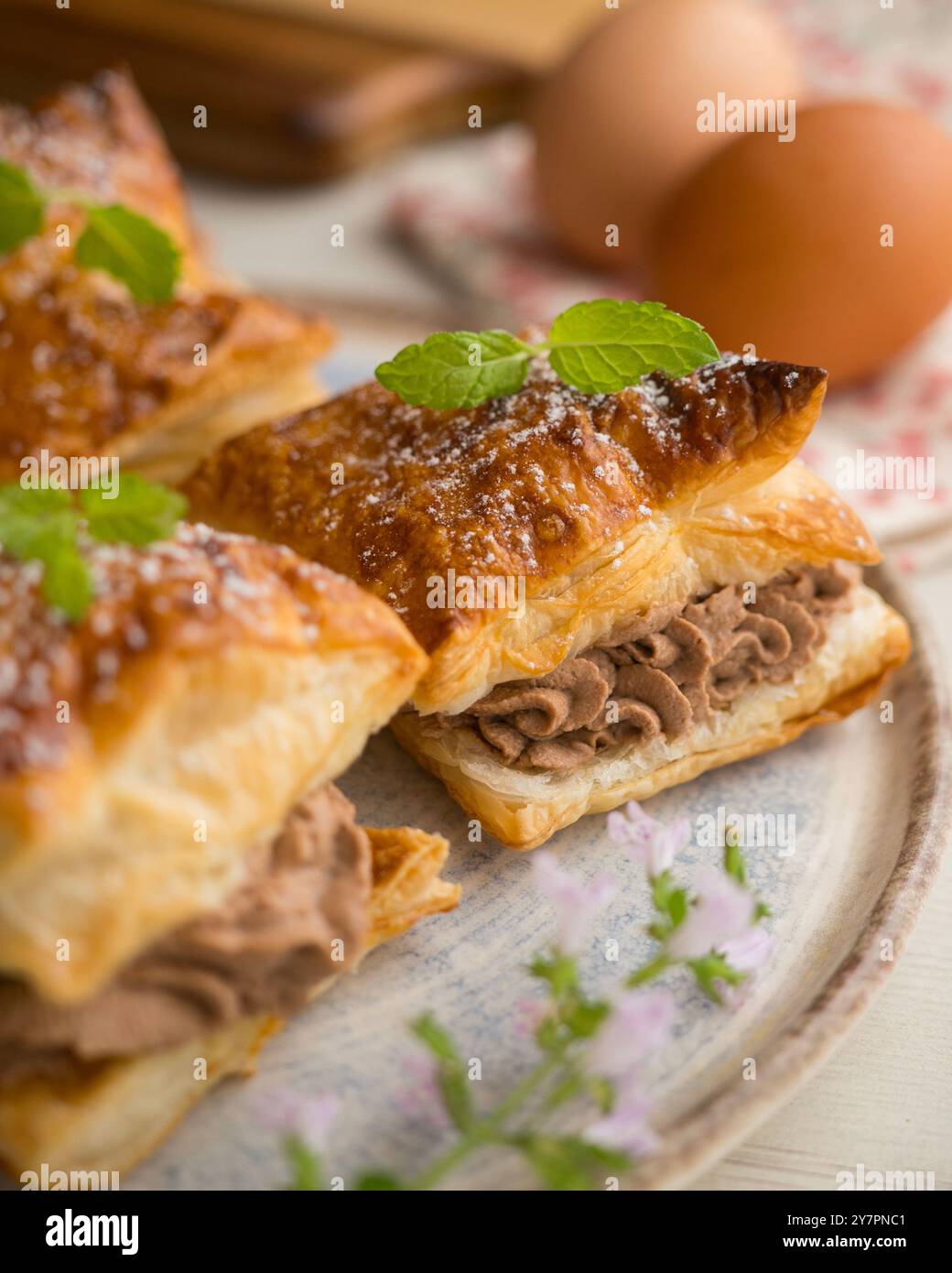 Miguelitos with chocolate truffle cream. Spanish chocolate puff pastry ...