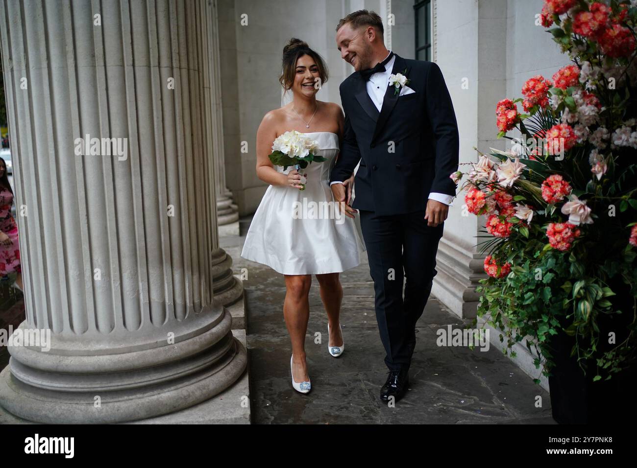Jack and Katie Webster arrive at Old Marylebone Town Hall in London ...