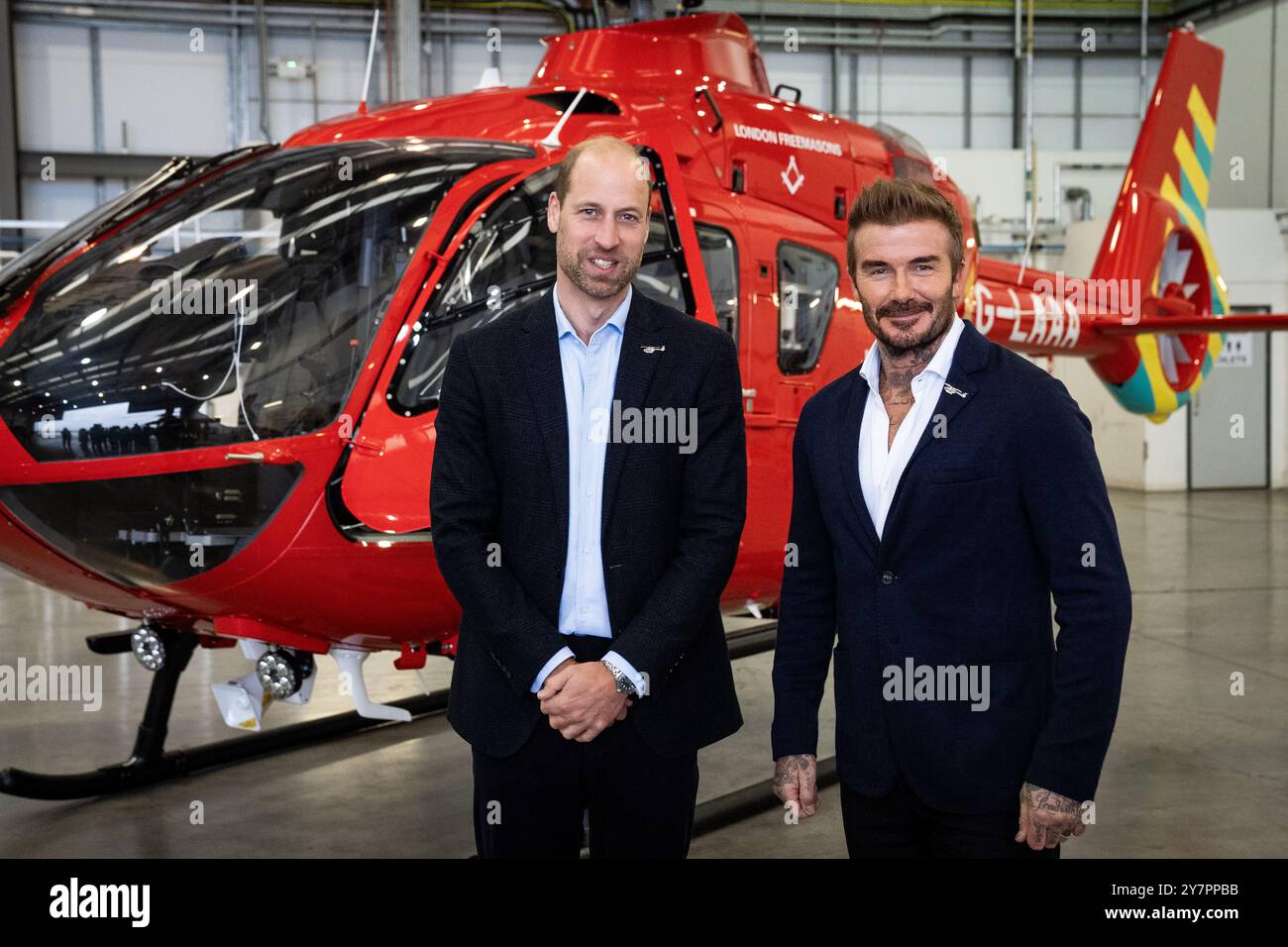 The Prince of Wales (left) with David Beckham in front of one of the ...