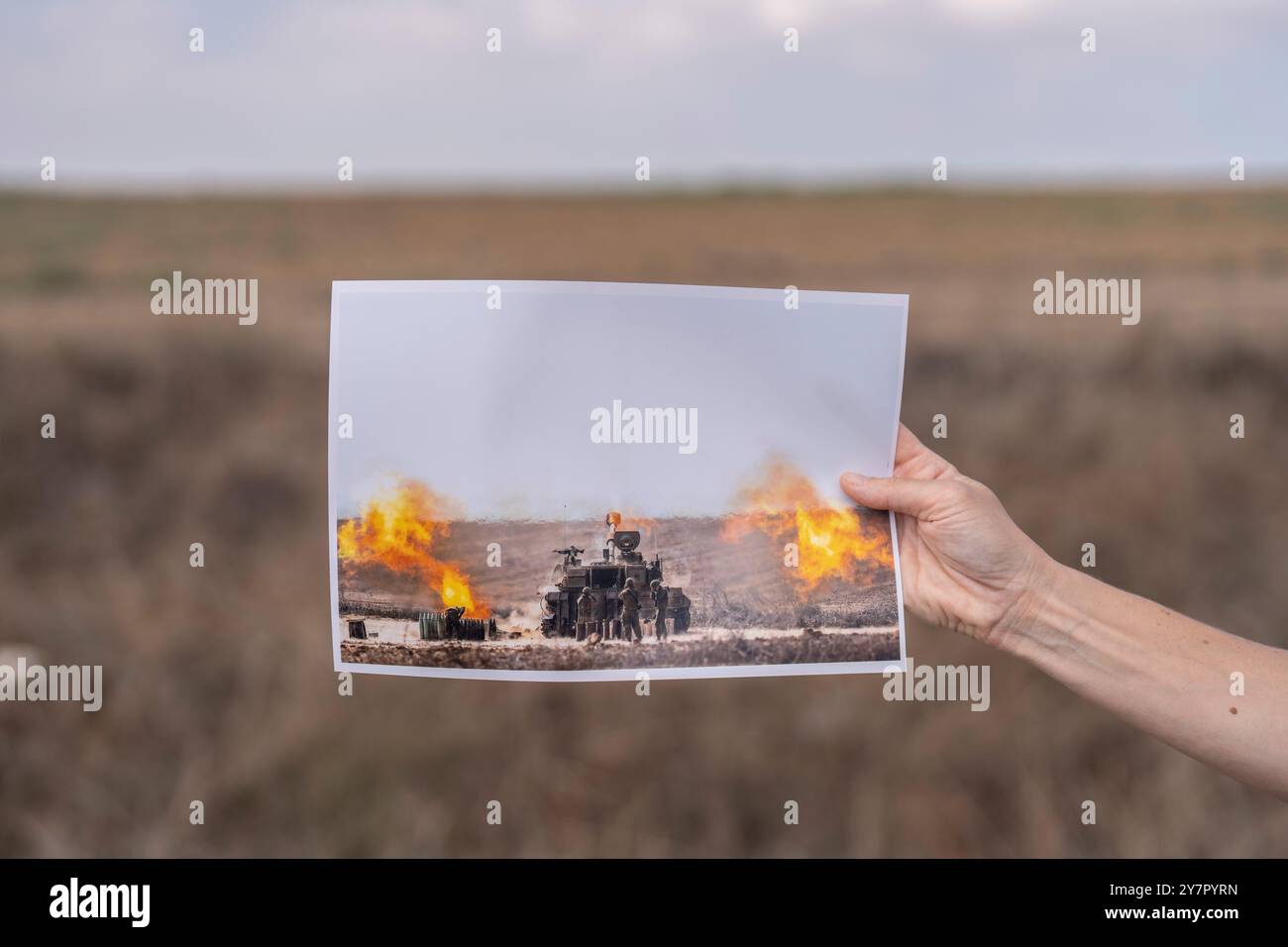 26 September 2024, Israel, Sderot: A picture shows a woman holding a ...