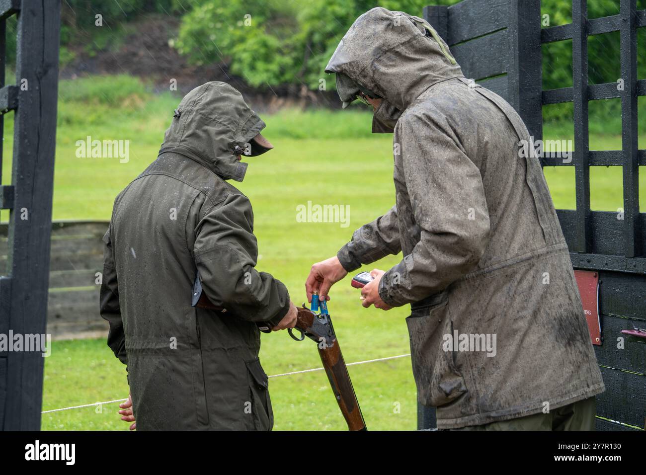 Shots being loaded into a shot gun at a shooting range. Photo date ...