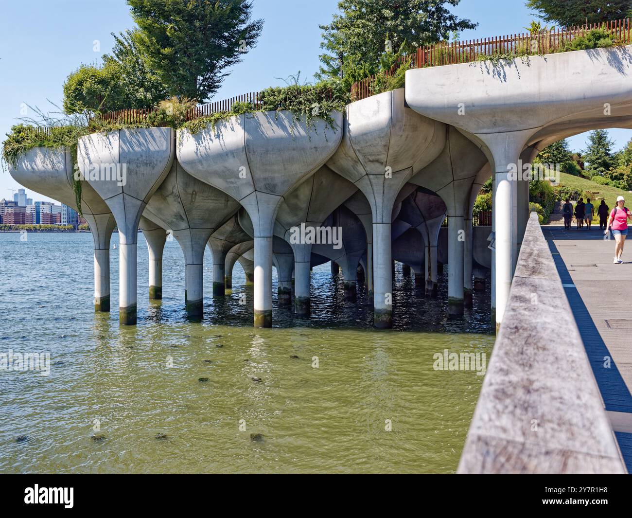 Little Island’s Southeast Overlook arches over the South Bridge. The ...