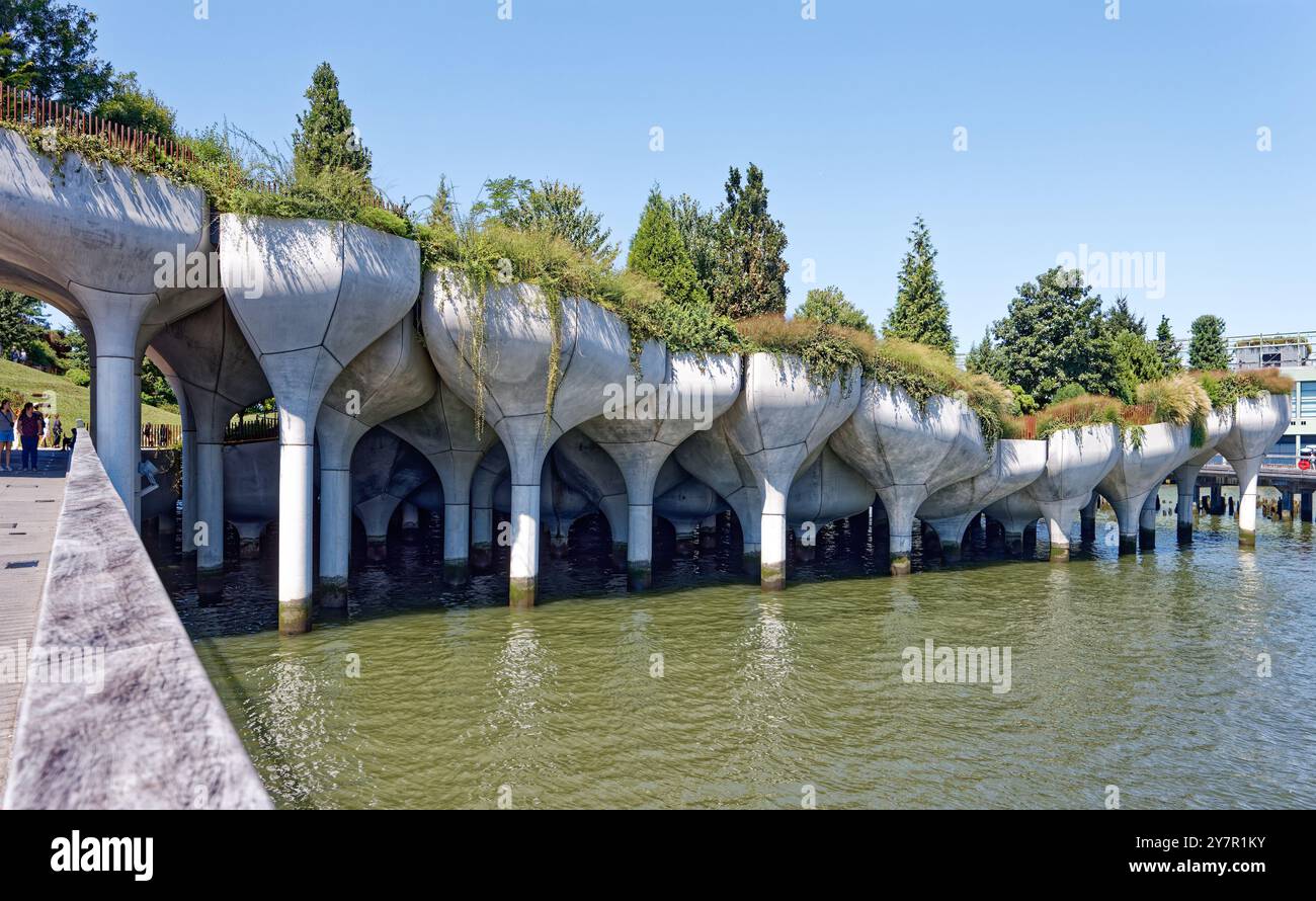 Little Island’s Southeast Overlook arches over the South Bridge. The ...