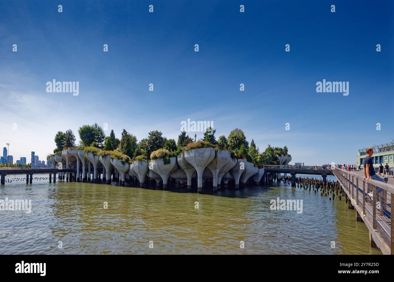A bright sky over NYC tourist mecca Little Island, the park built atop ...