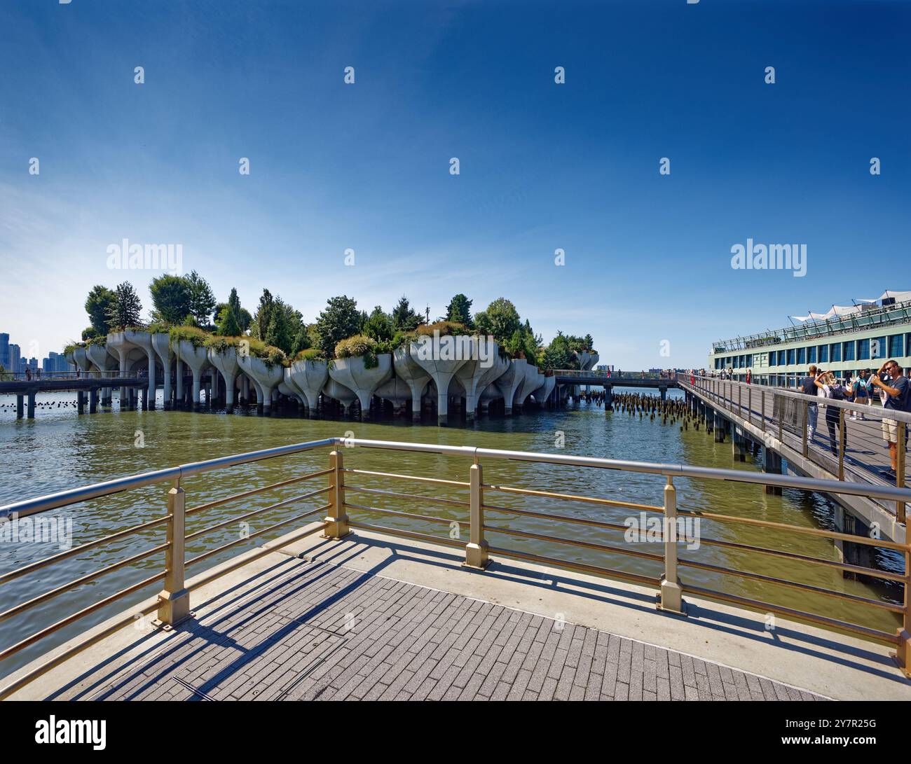 A bright sky over NYC tourist mecca Little Island, the park built atop ...