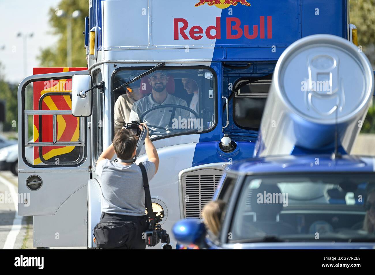 Triple gold medalist rower Martin Sinkovic drove the Red Bull party bus ...