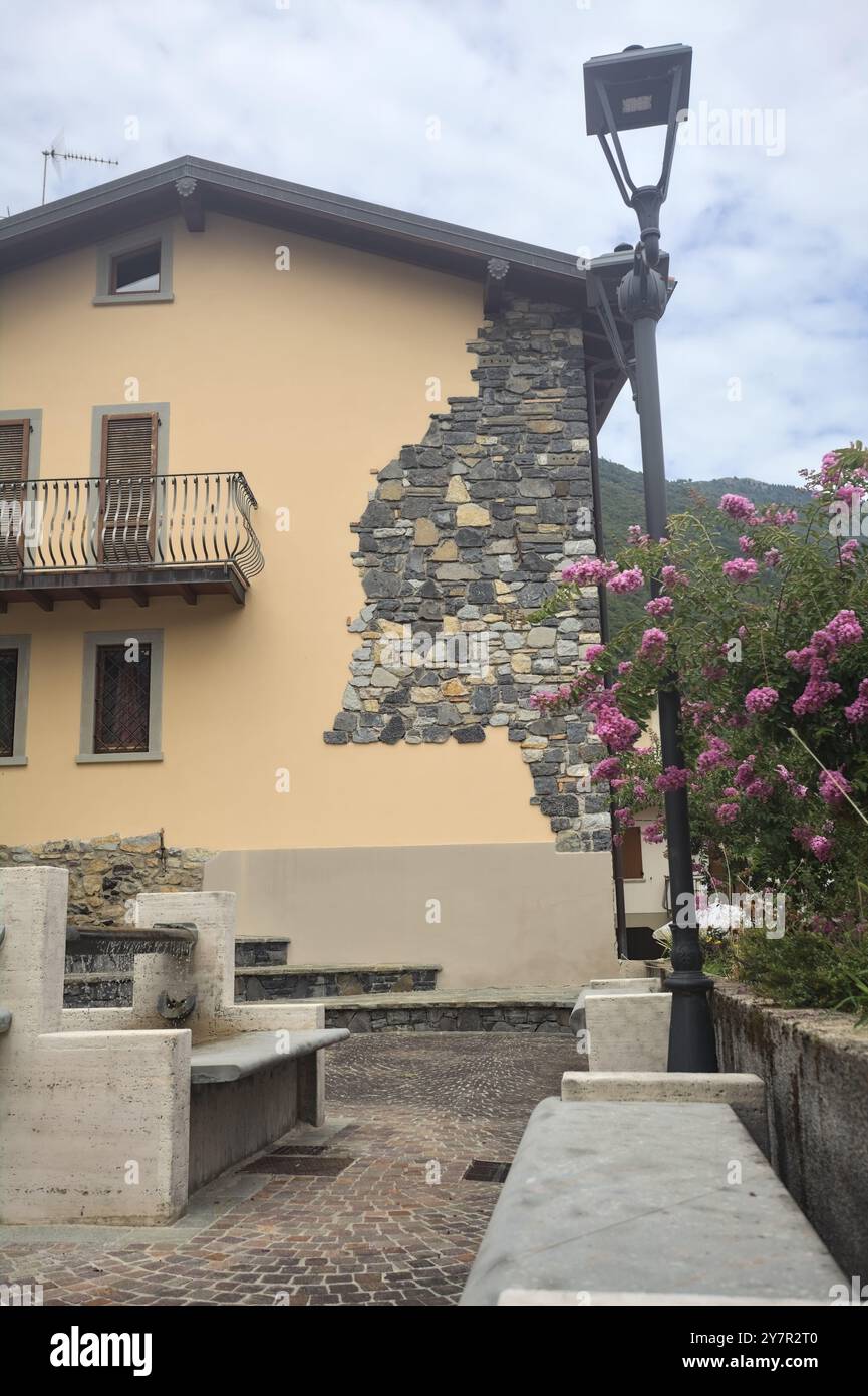 Square enclosed between historic buildings with a fountain in the ...