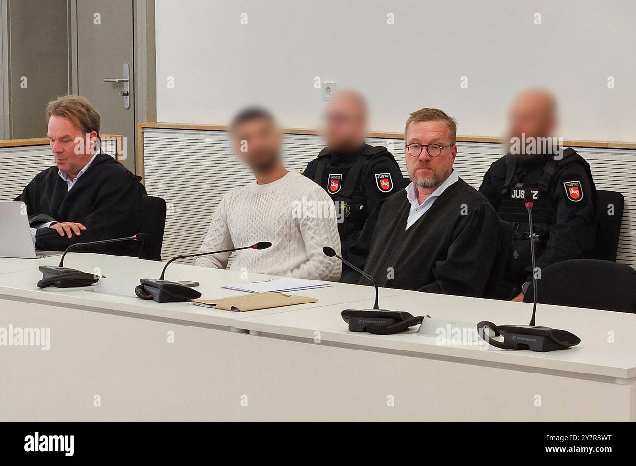 Brunswick, Germany. 01st Oct, 2024. A defendant (2nd from left) sits ...