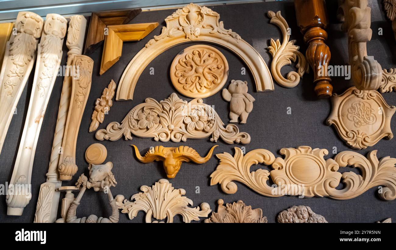 carving element. furniture in classic style. white color wood with gold ...