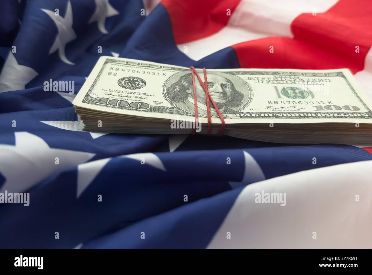 One hundred dollars banknotes on flag background Stock Photo - Alamy