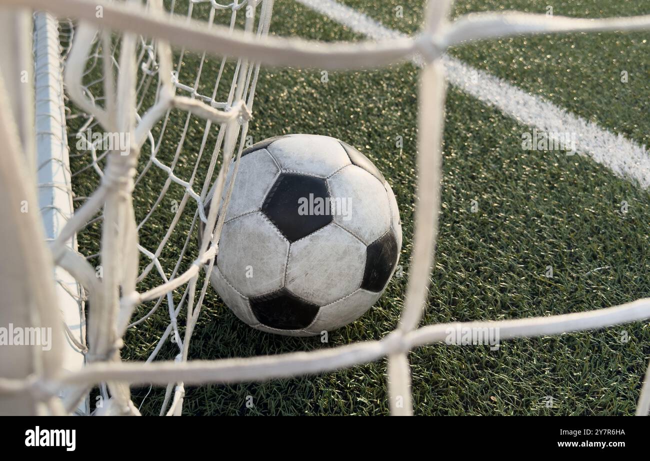 Traditional soccer ball on soccer field Stock Photo - Alamy