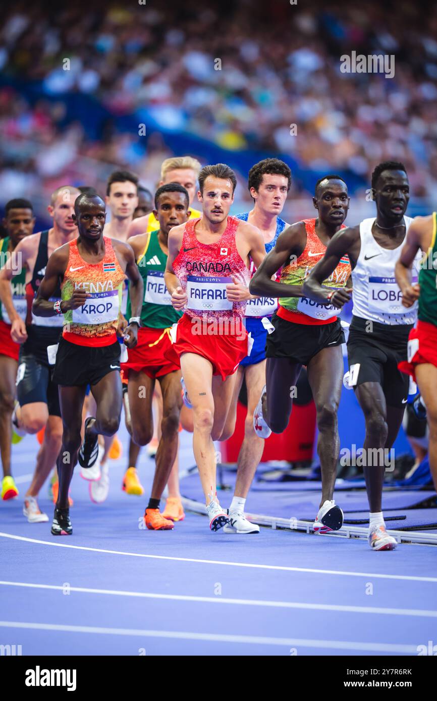 Thomas Fafard participating in the 5000 meters at the Paris 2024 ...