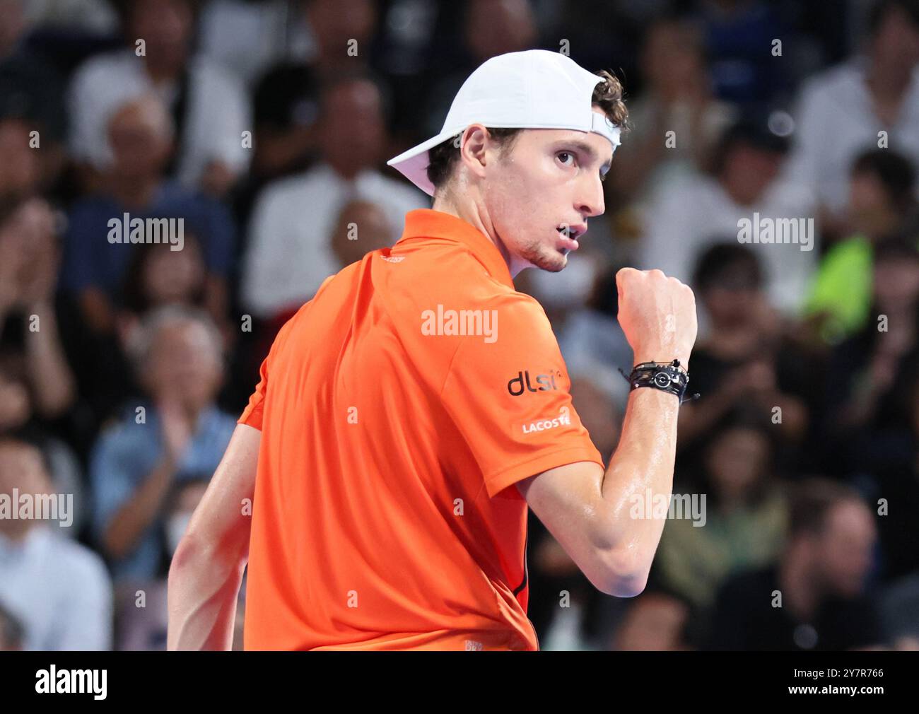 October 1, 2024, Tokyo, Japan - Ugo Humbert of Francei clinches his fist as he won a key point ...