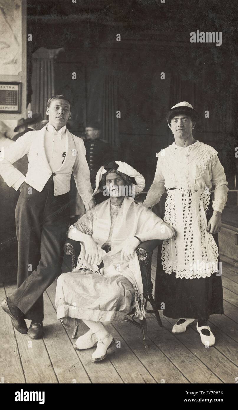 Vintage photograph of three soldiers, two in drag, pose in costume ...