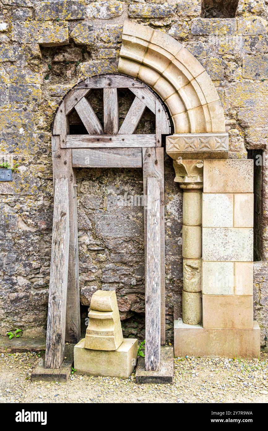 A reconstruction demonstrating the building of a semi circular Norman ...