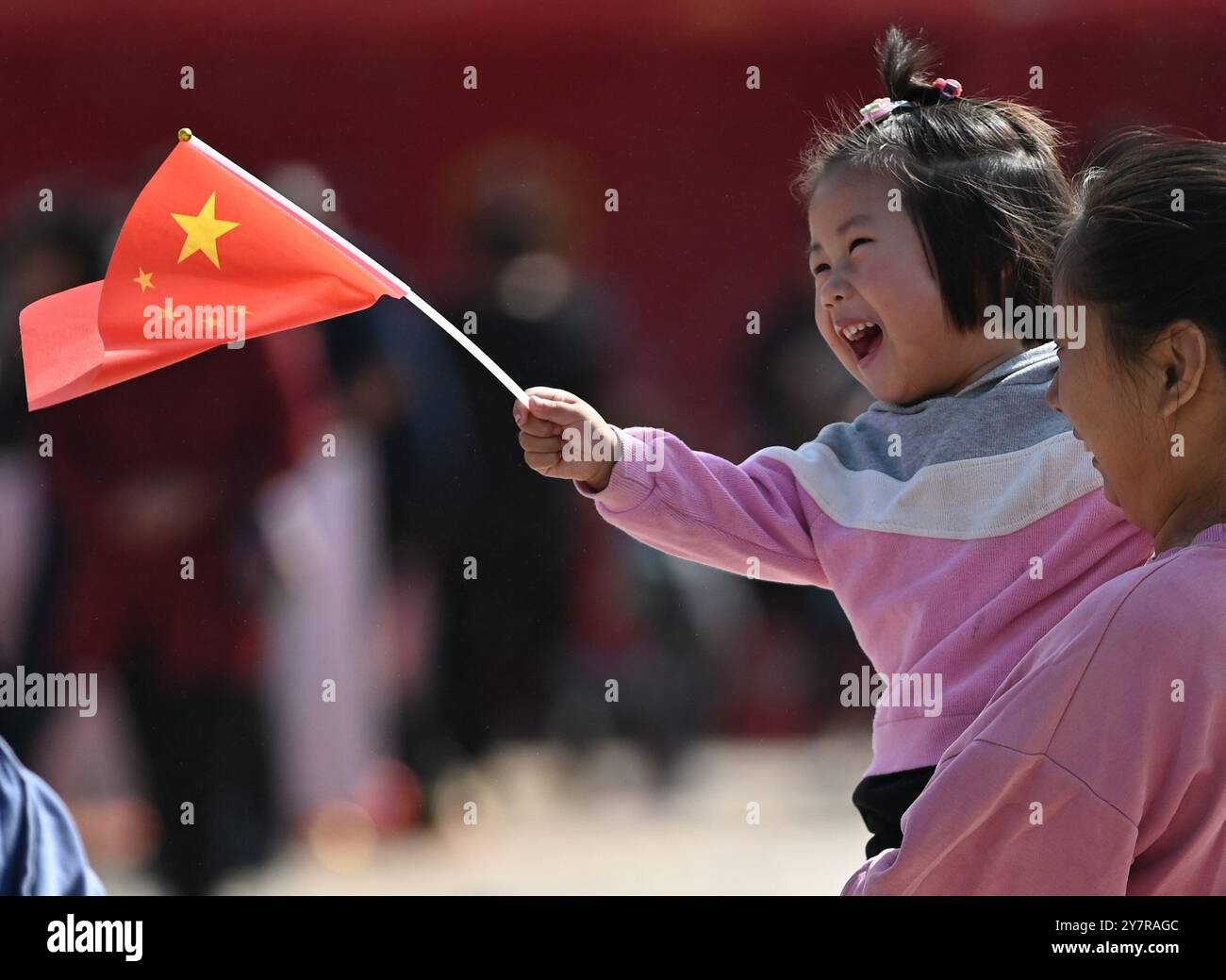 Child holding chinese national flag hi-res stock photography and images ...