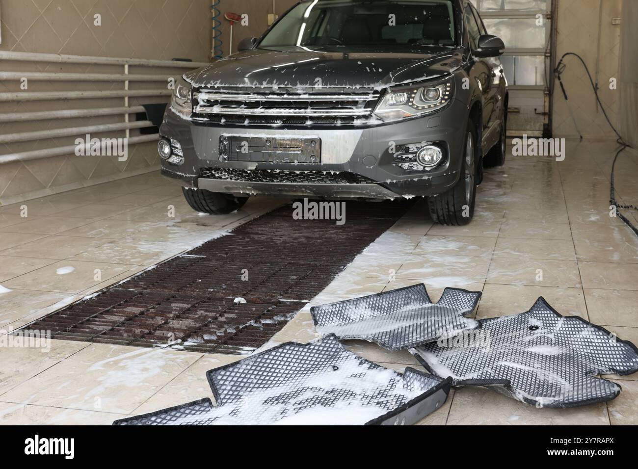 Car floor mats covered with foam and modern auto indoors Stock Photo ...