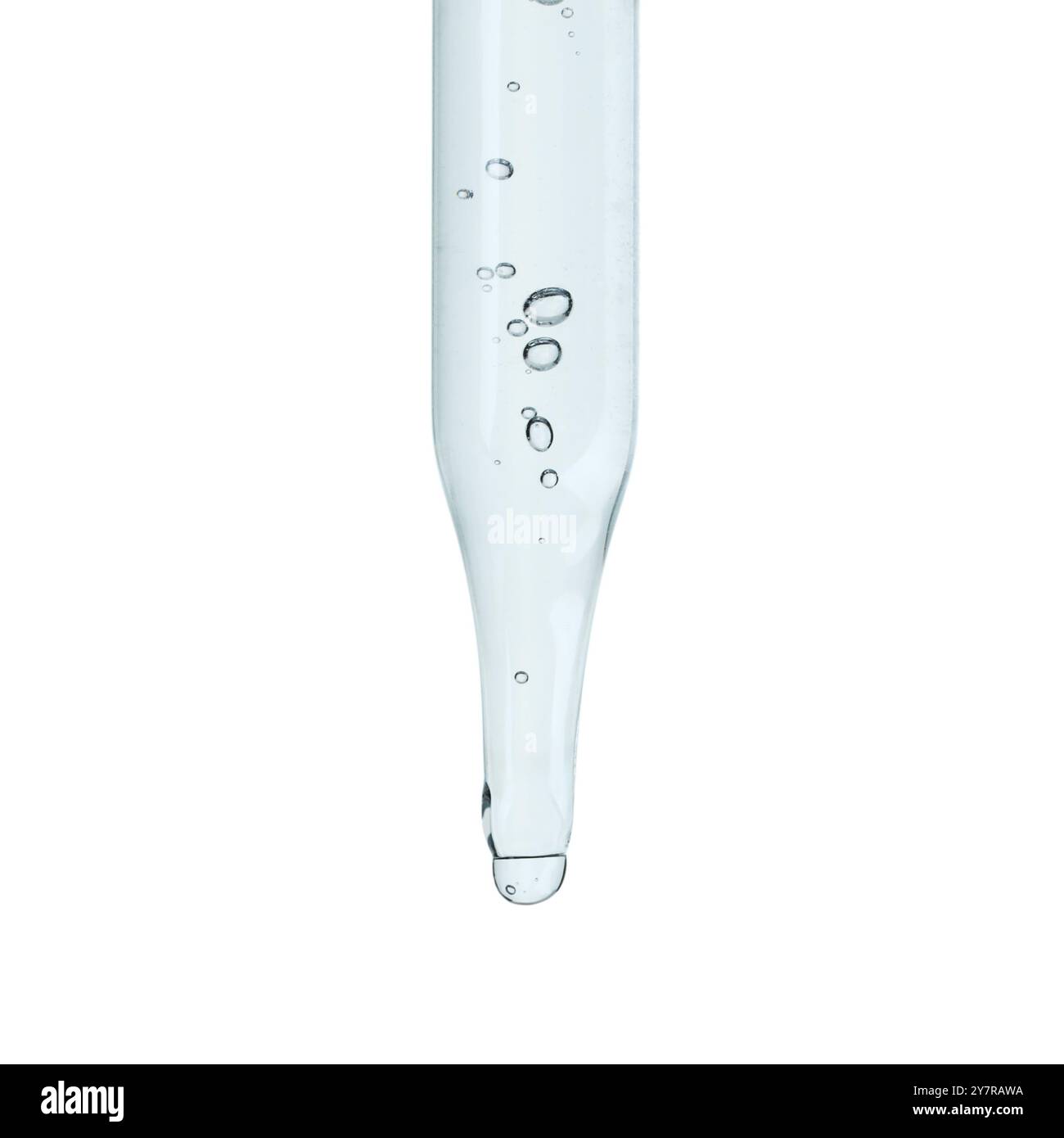 Dripping cosmetic serum from pipette on white background Stock Photo ...