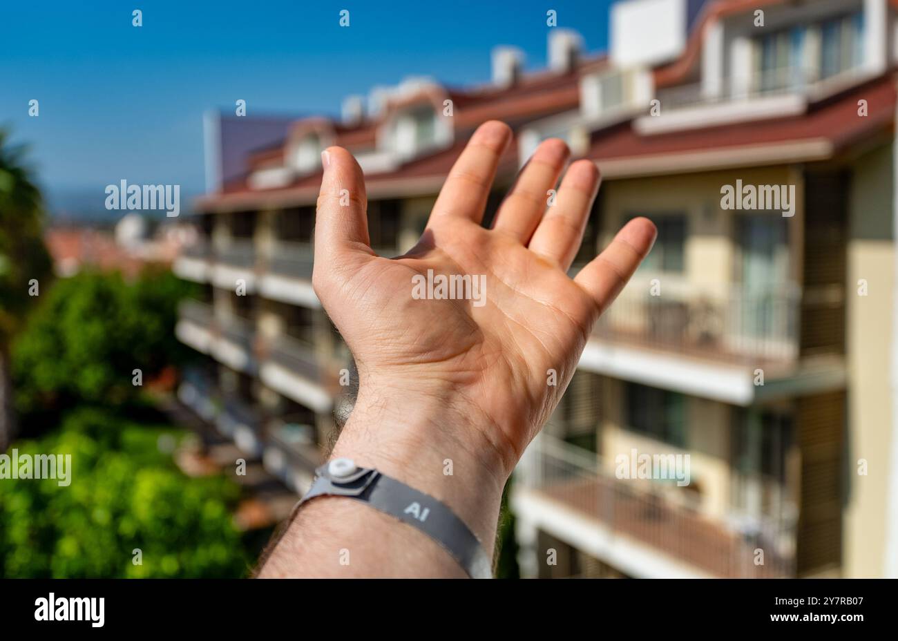 Male hand with all inclusive bracelet against hotel background Stock ...