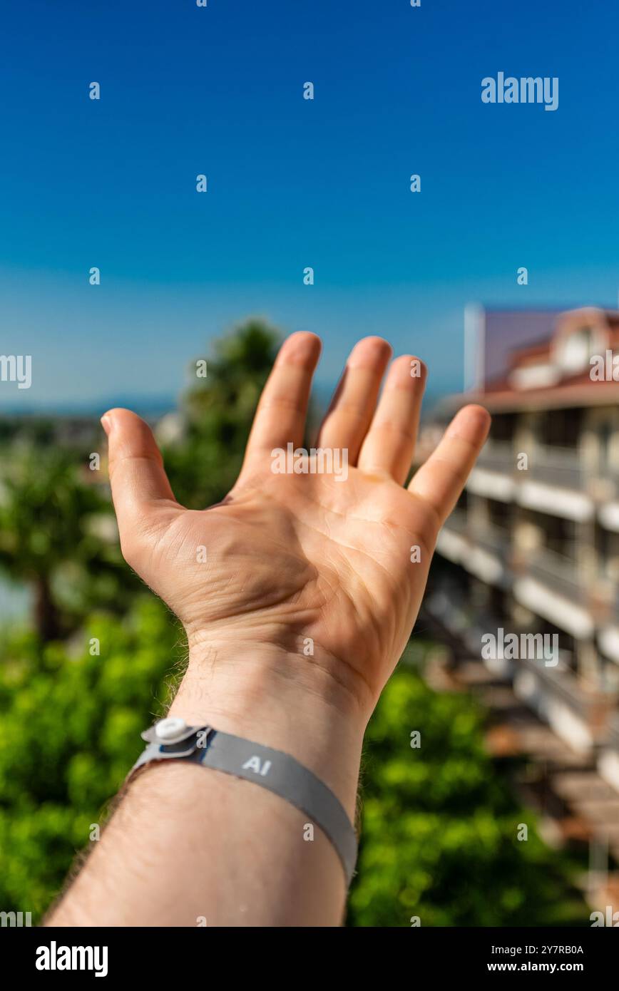 Male hand with all inclusive bracelet against hotel background Stock ...