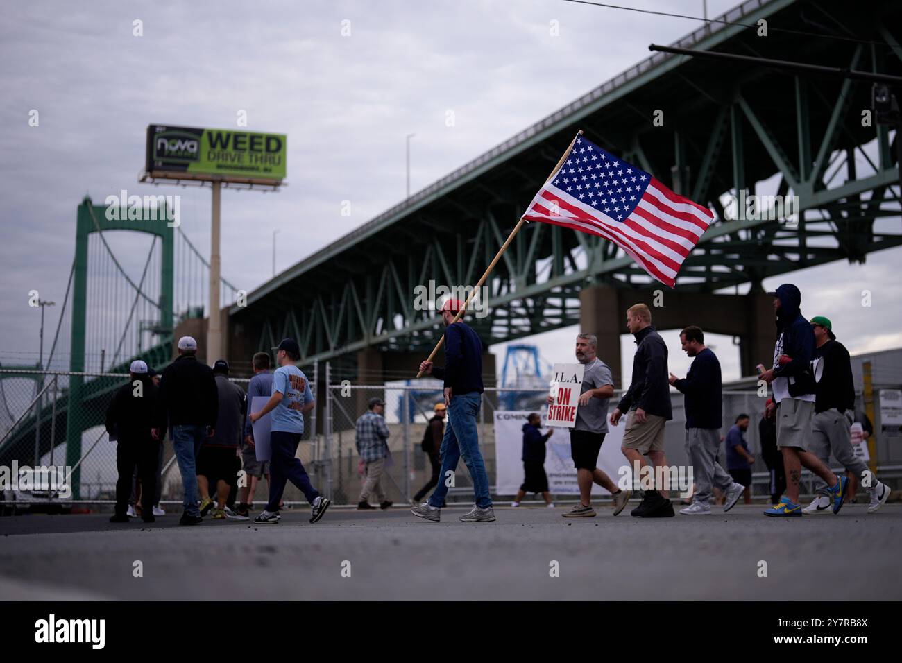 Striking longshoreman picket outside the Packer Avenue Marine Terminal ...
