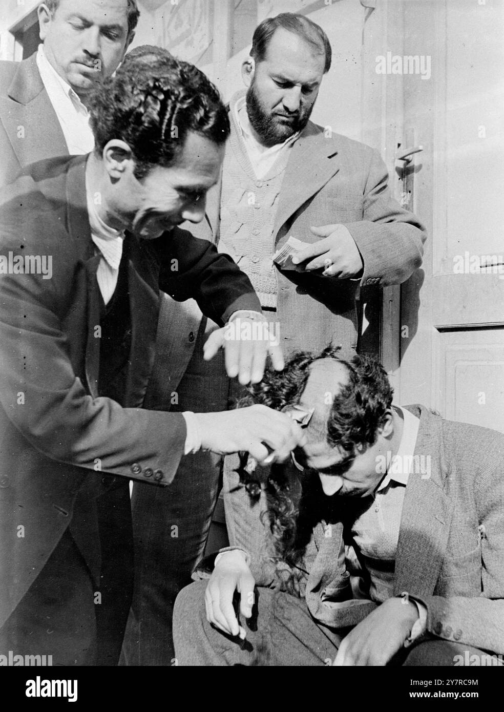TEHERAN COMMUNISTS GET HEADS SHAVED IN PUBLIC 15.2.54. Communists in ...