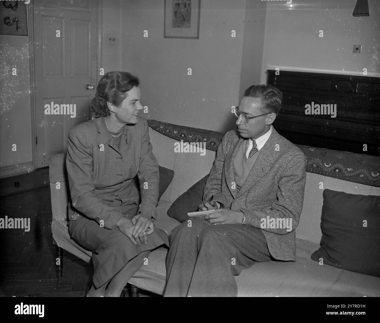 KATE FIELD TALKS WITH JOHN HVASTA AT LONDON AIRPORT ABOUT HER HUSBAND ...