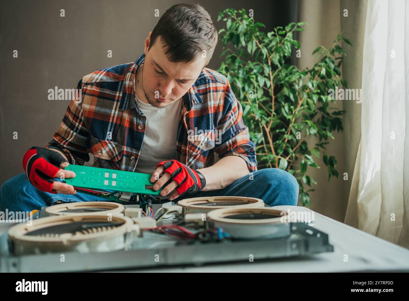 Seated repair hi-res stock photography and images - Alamy