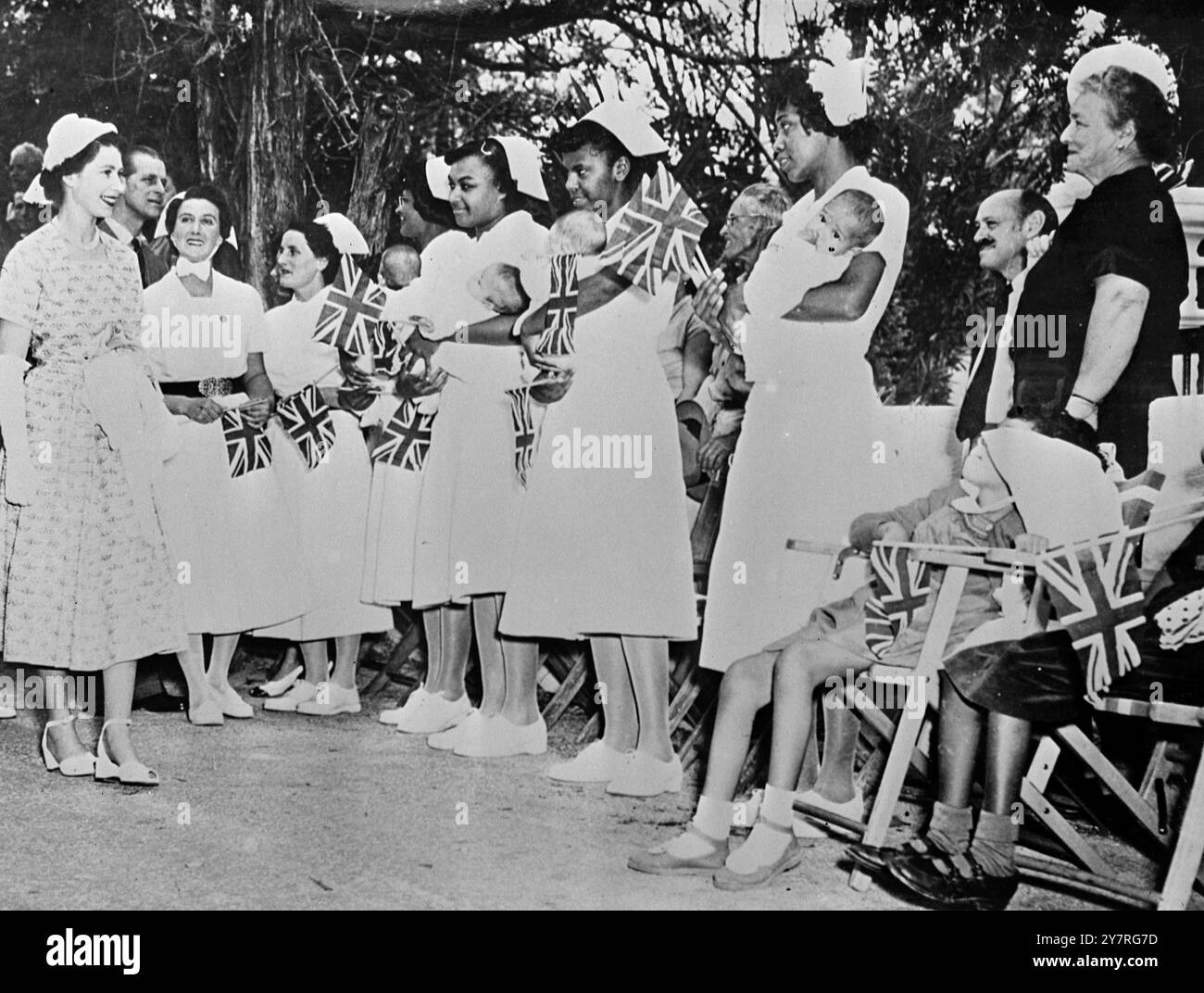 12930 queen sees triplets during Bermudan visit. 25.II.53. I.N.P. photo ...