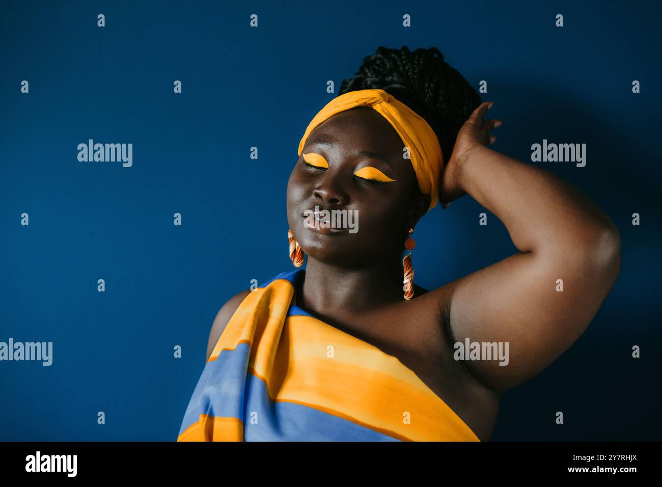 Beautiful plus size African woman wearing traditional African attire ...