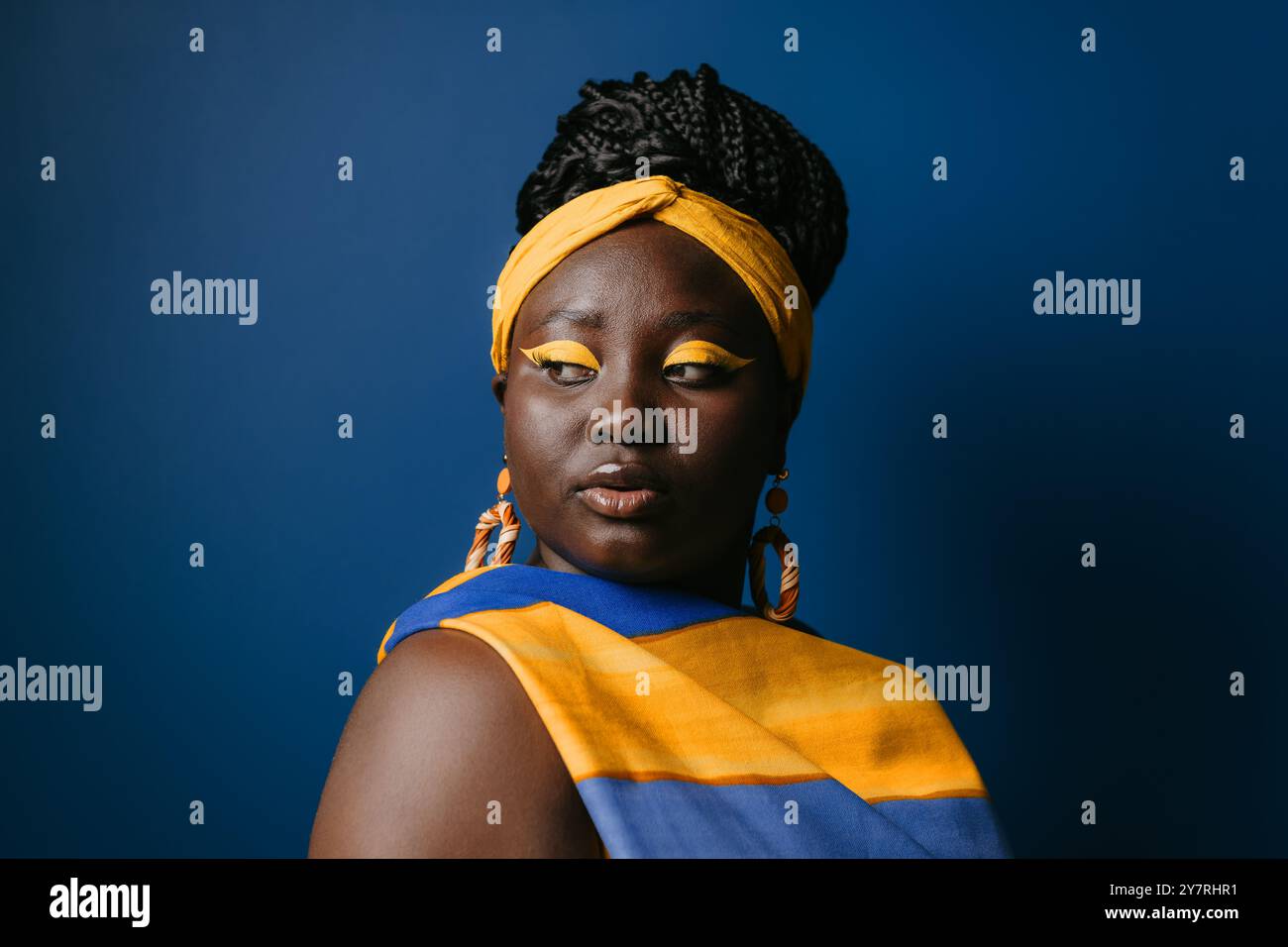 Portrait of beautiful plus size African woman wearing traditional ...