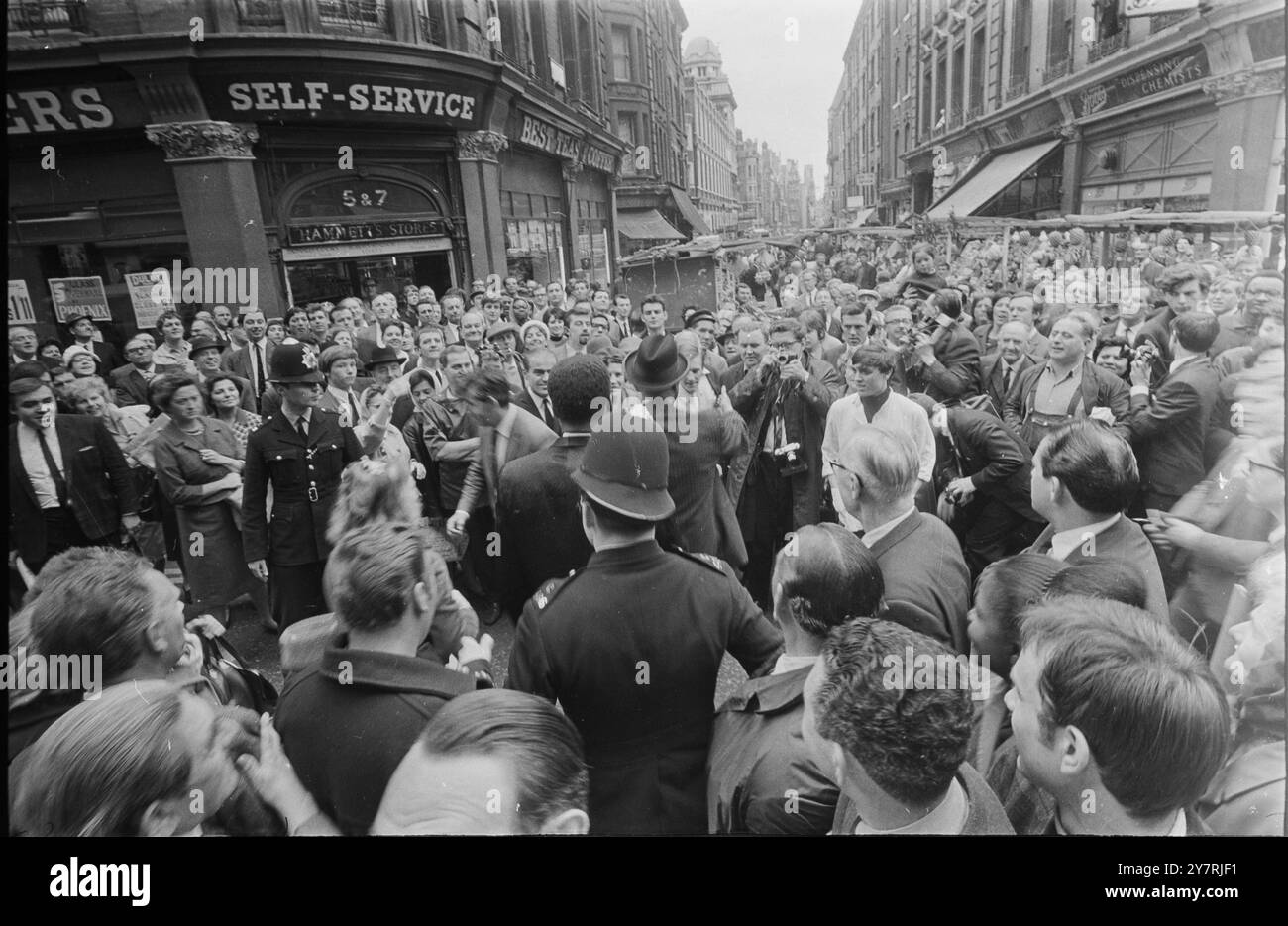 LONDON , UK - 19 May 1966 : Crowds of fans follow the World Heavyweight ...