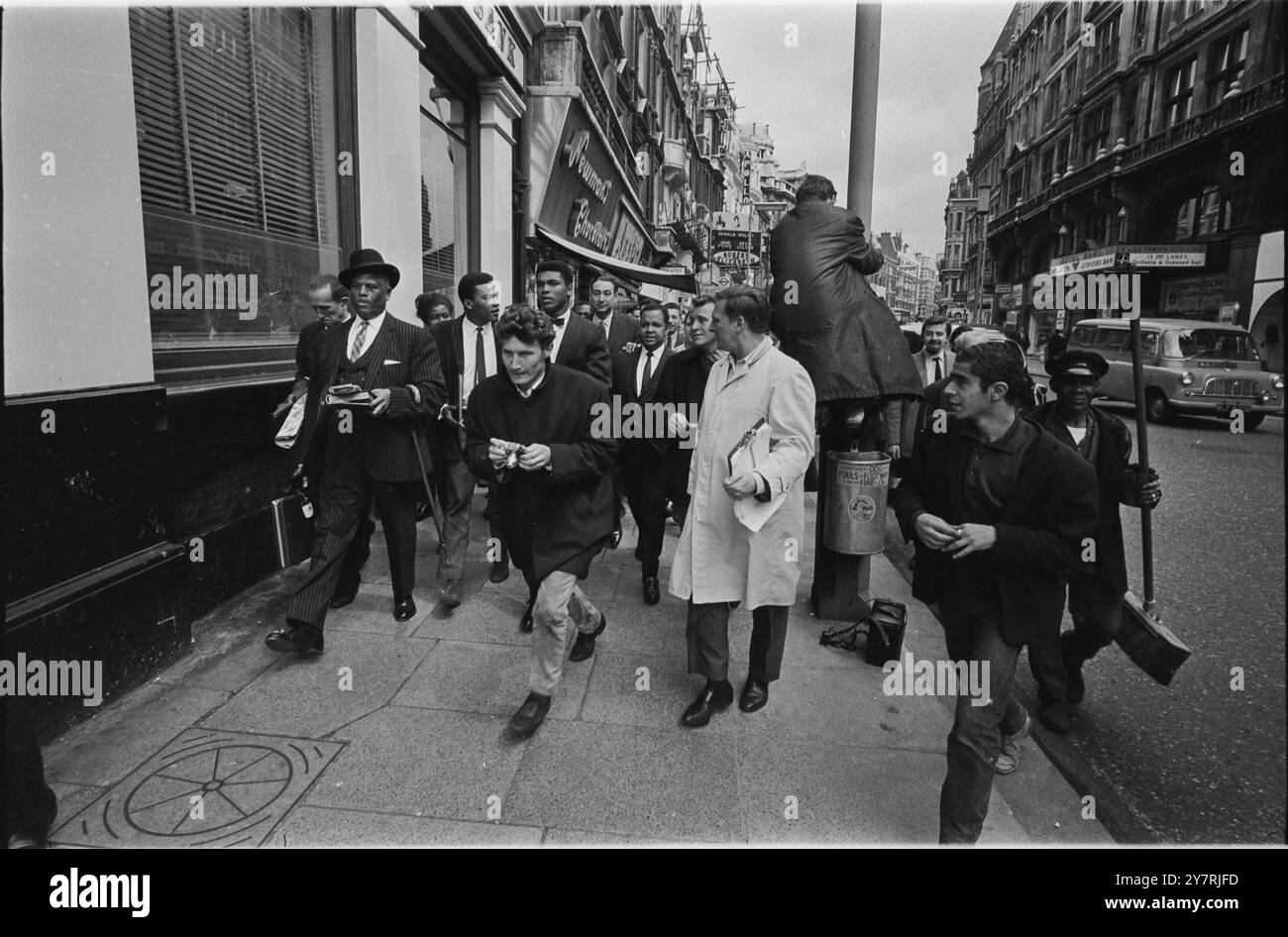 LONDON , UK - 19 May 1966 : Crowds of fans follow the World Heavyweight ...