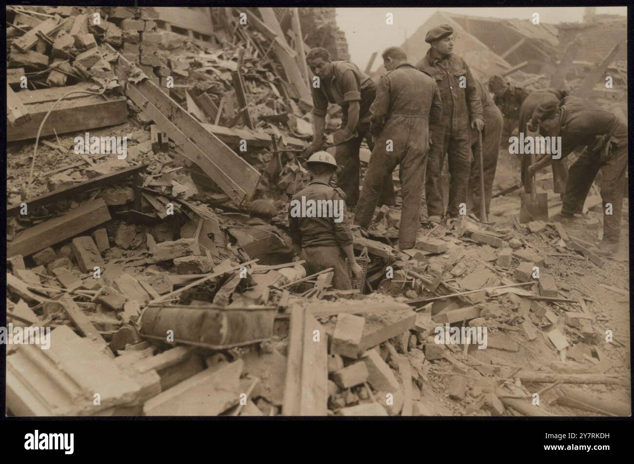 Houses were damaged during night raids on the London area when bombs ...