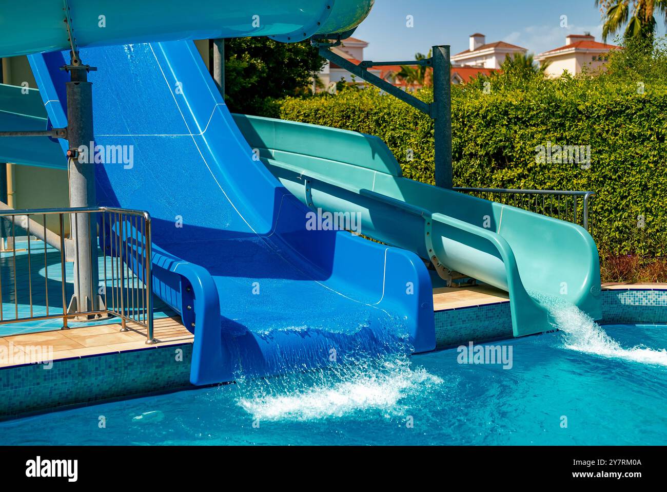 Colorful plastic water-slides in aqua park Stock Photo - Alamy