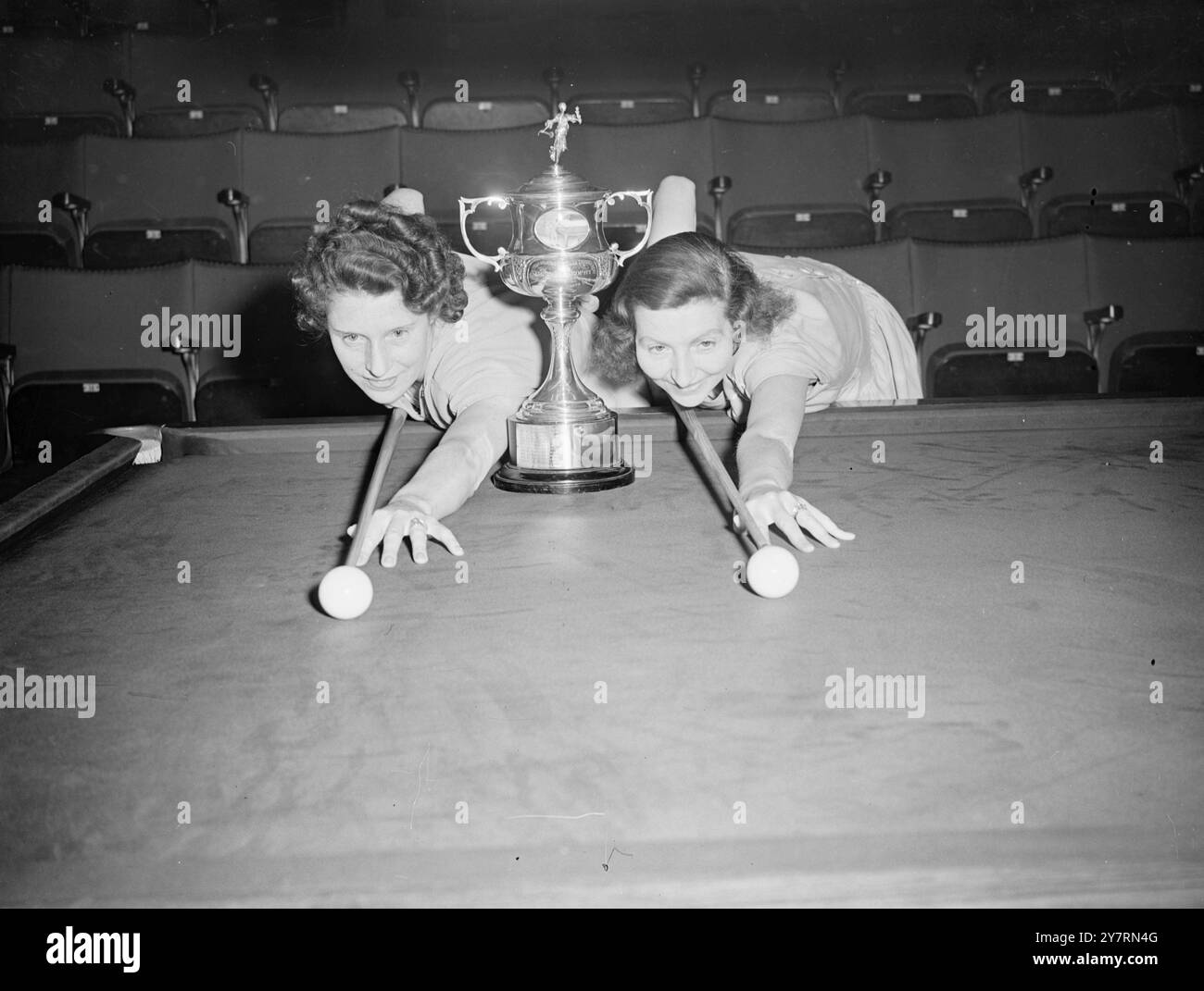 AIMING FOR THE CUP JOYCE GARDNER (left) of Stanmore and Thelma Carpenter (Bournemouth), the ...