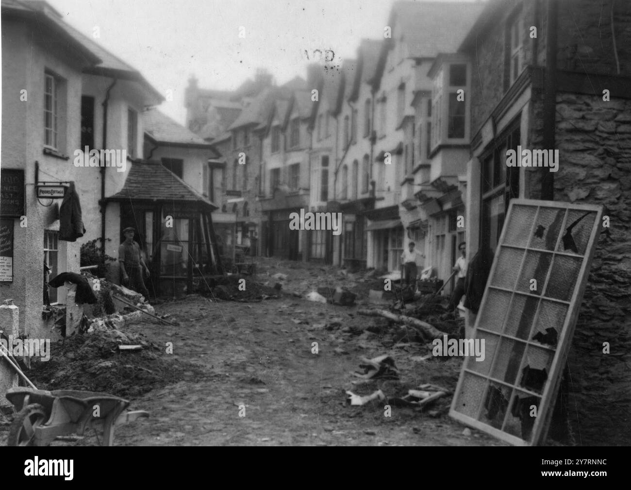FLOODS LEAVE LYNMOUTH A WRECK. Lynmouth, North Devon: Debris litters ...