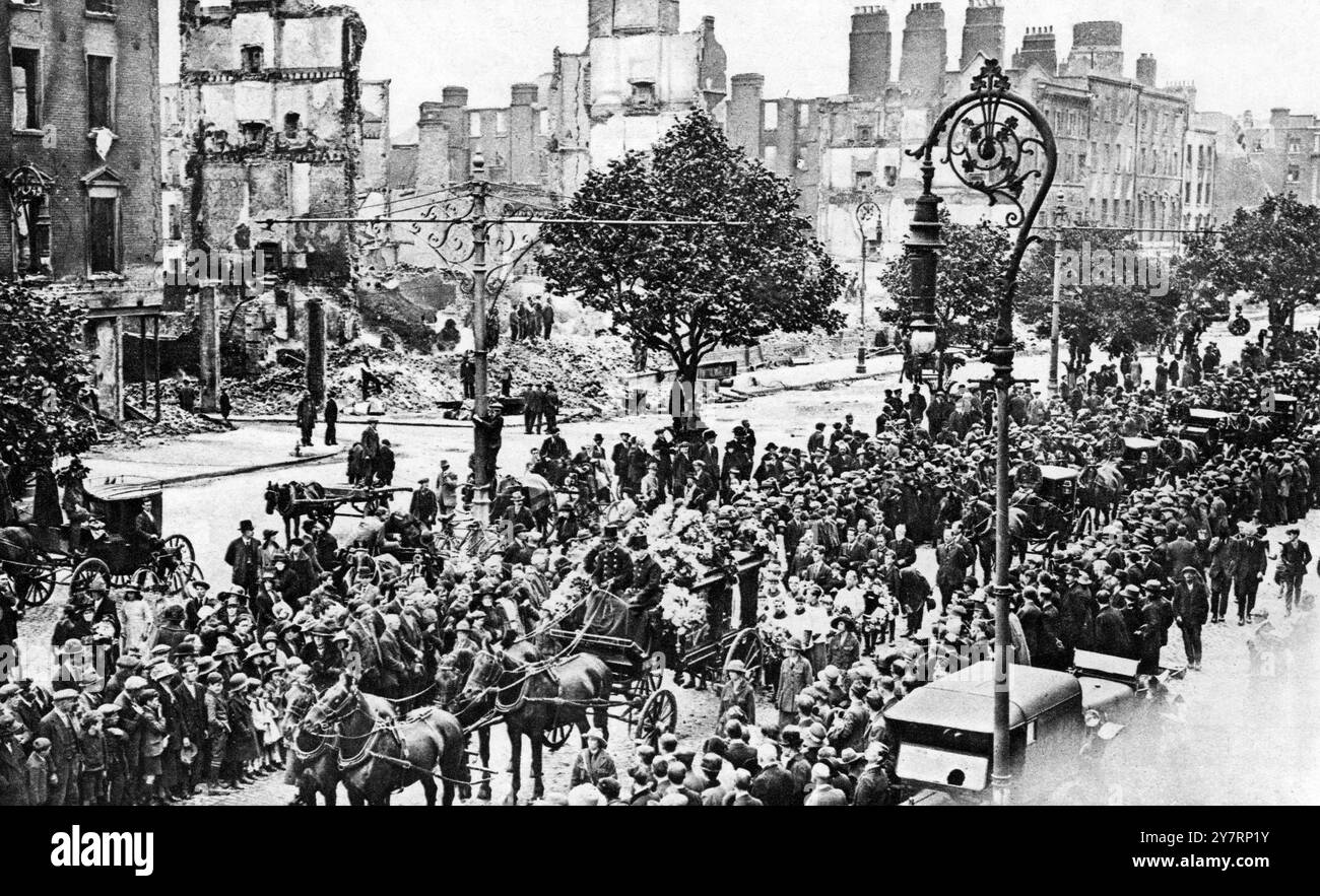 Passing the ruins of the Granville Hotel, where he was shot when he ...