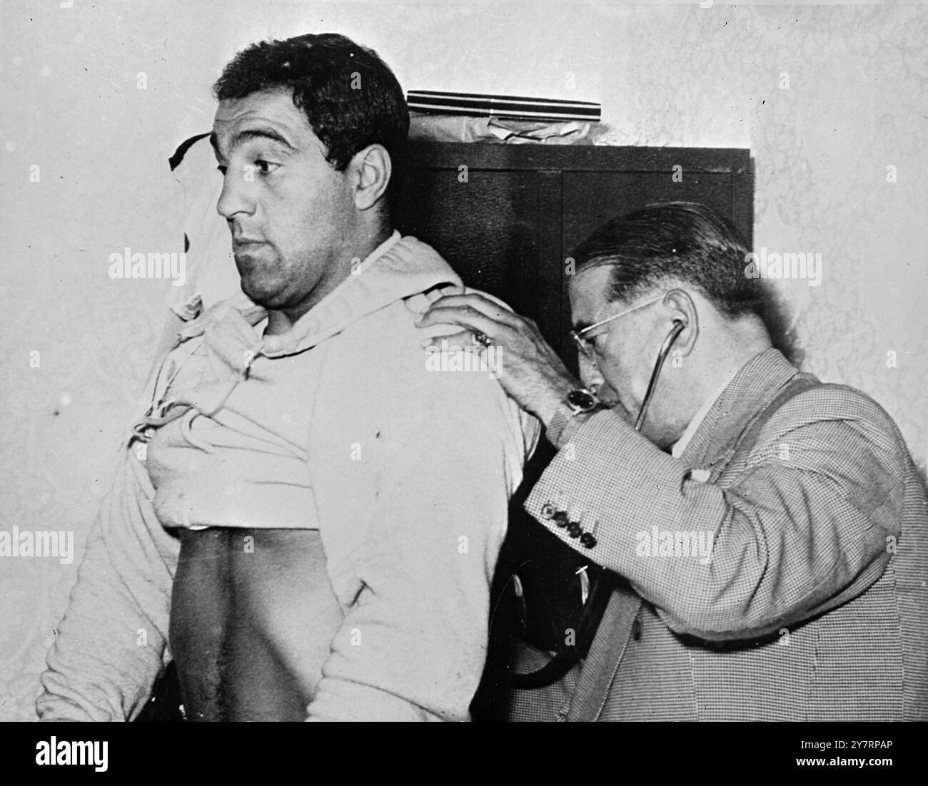 ROCKY GETS A ONCE-OVER - 22.9.53. - Rocky Marciano, who defends his ...