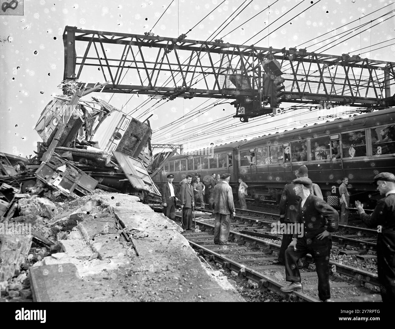 TRAIN SPLITS IN TWO IN LONDON STATION - 4.9.53. - A train travelling ...