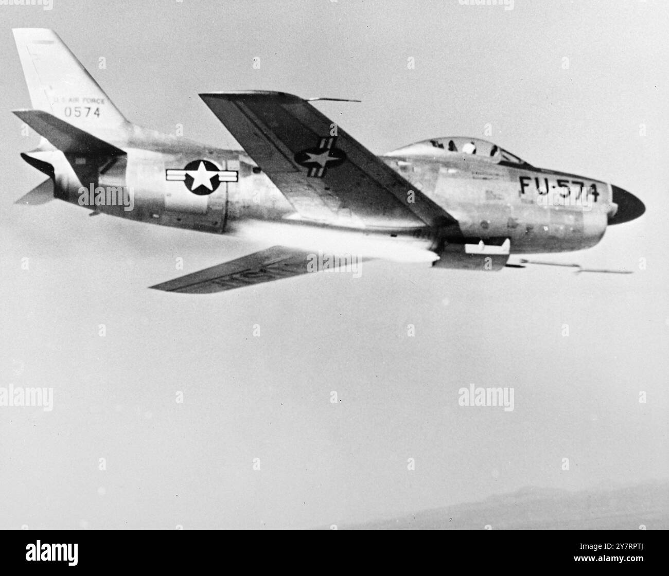 ROCKETS AWAY 10.9.53. From a retractable launching pod beneath its ...