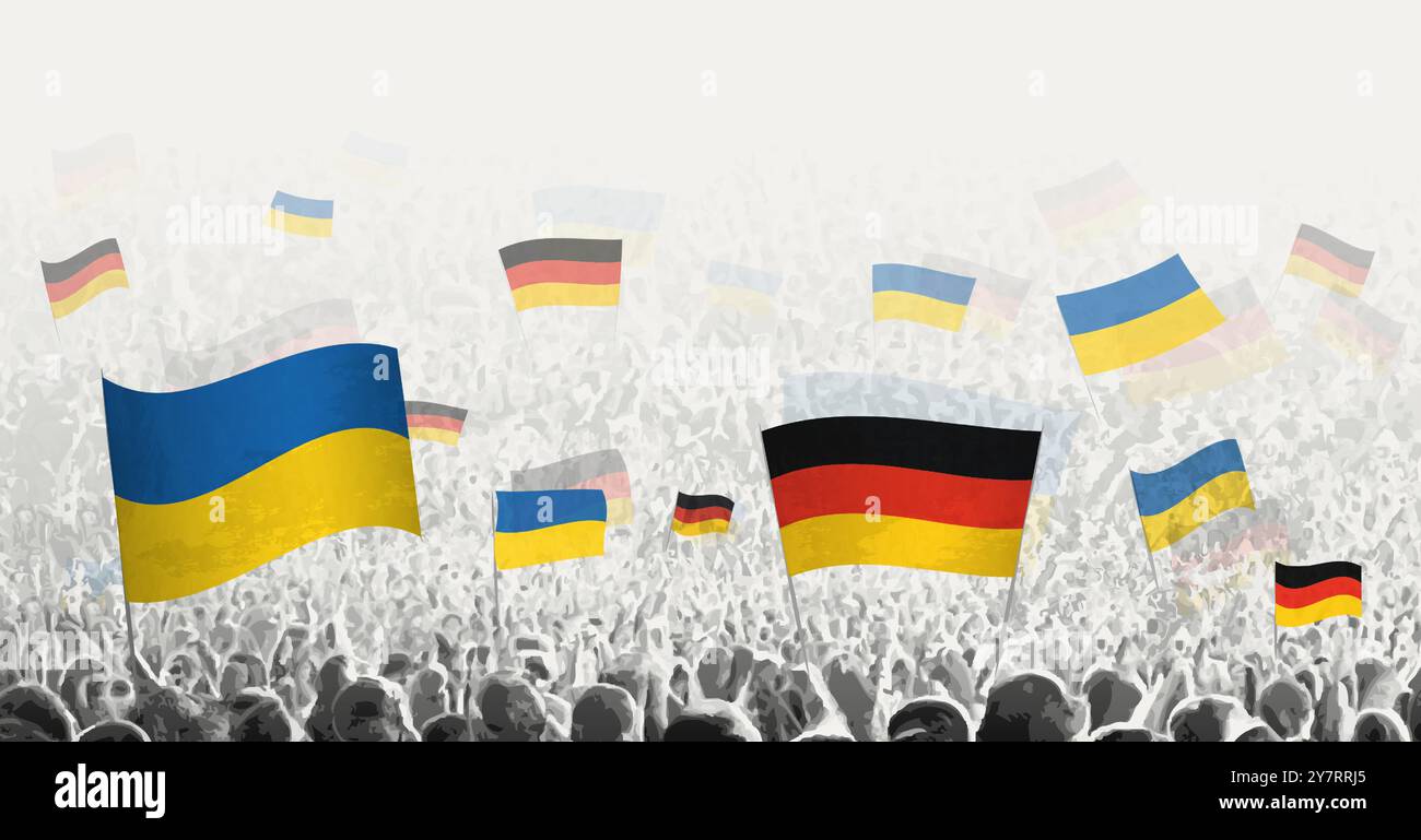 People waving flag of Germany and Ukraine, symbolizing Germany ...